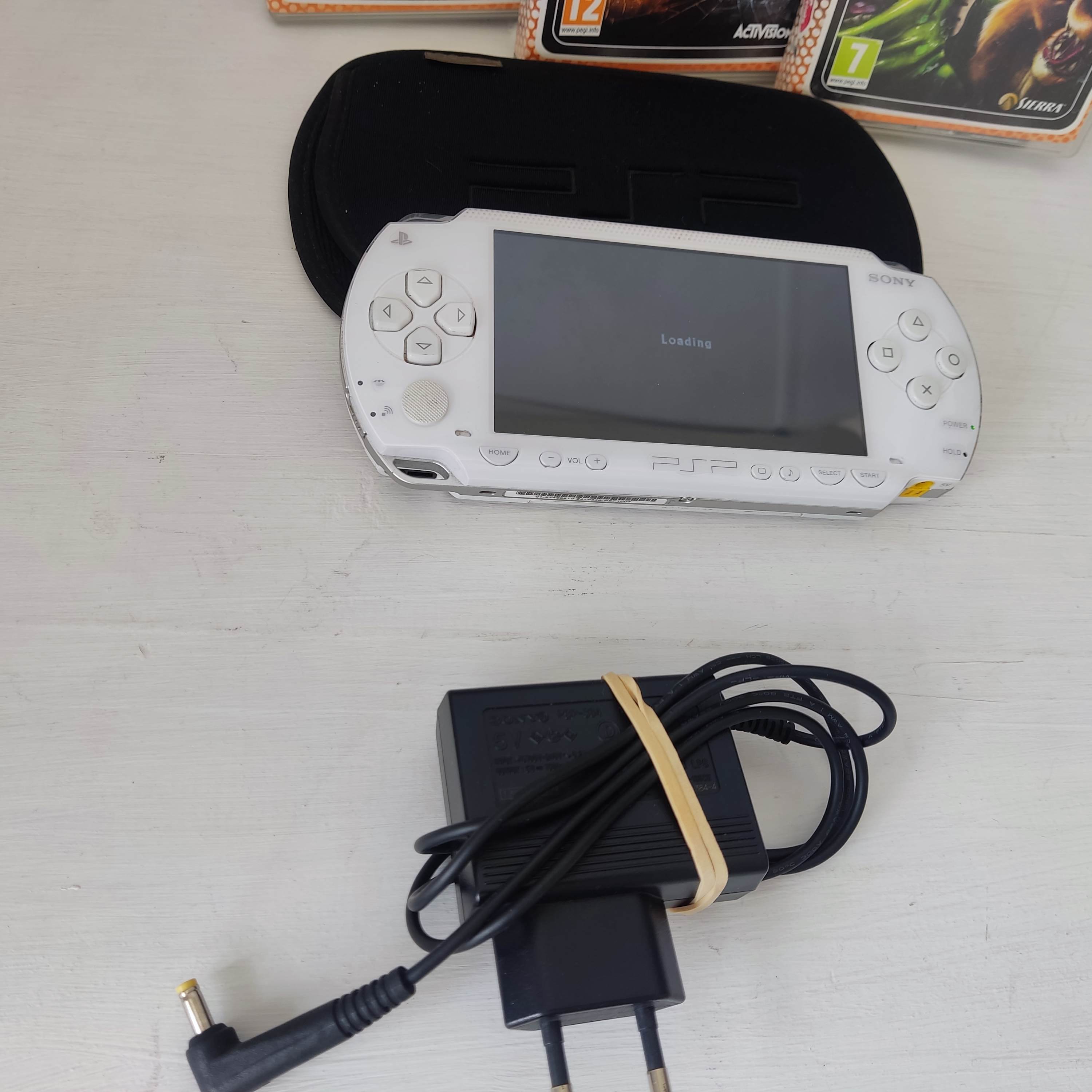 PlayStation - Psp console and games Sony model Psp 1003 for sale in ...