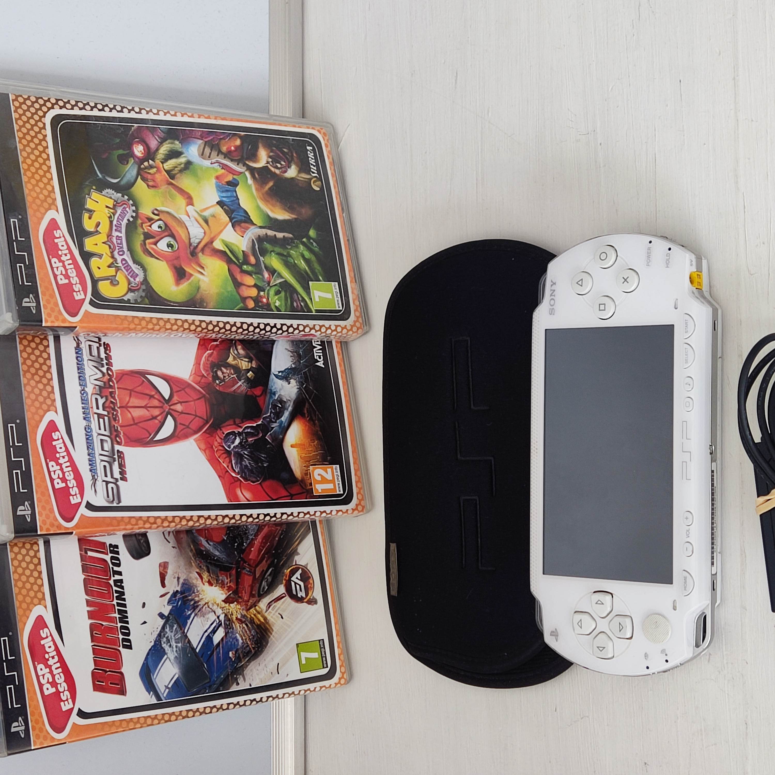 PlayStation - Psp console and games Sony model Psp 1003 for sale in ...